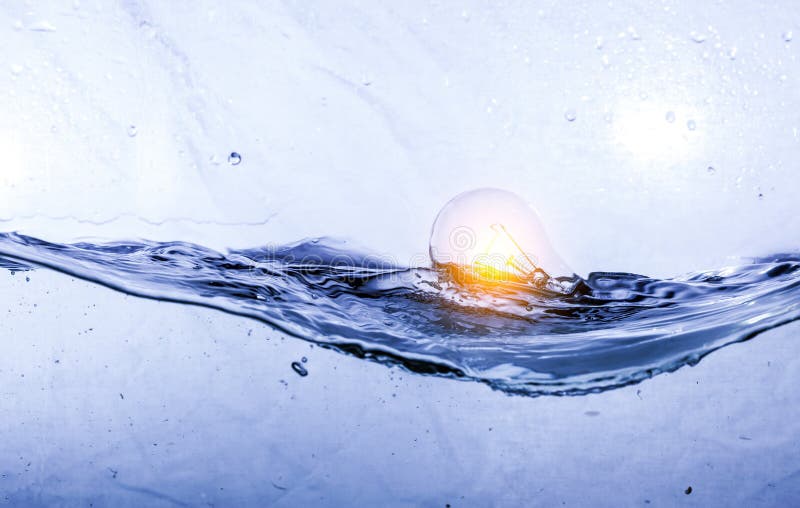 Splashing Light Bulb stock photo. Image of electricity - 109337592
