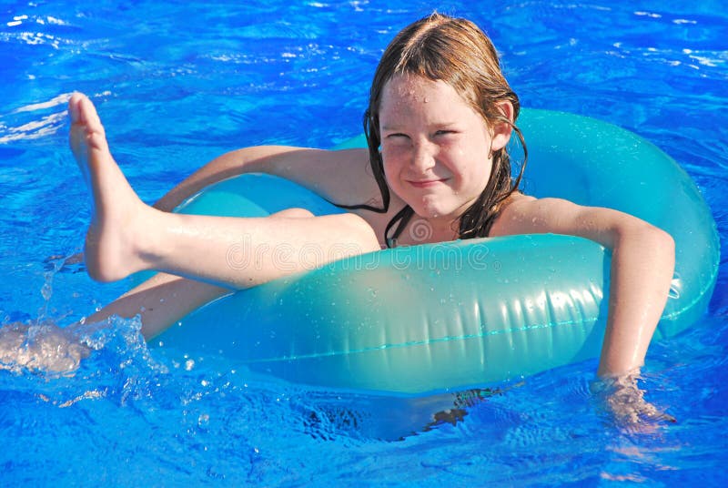 Splashing in the pool stock photo. Image of cute, weekend - 9656004