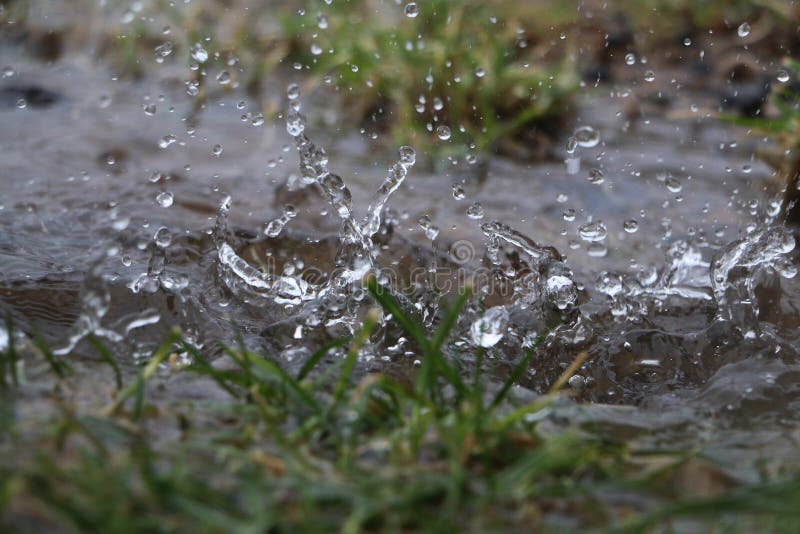 Splashing Rain in the Puddle Stock Image - Image of close, puddles ...
