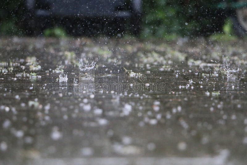 Splashing Rain in the Puddle Stock Image - Image of motion, heavy ...