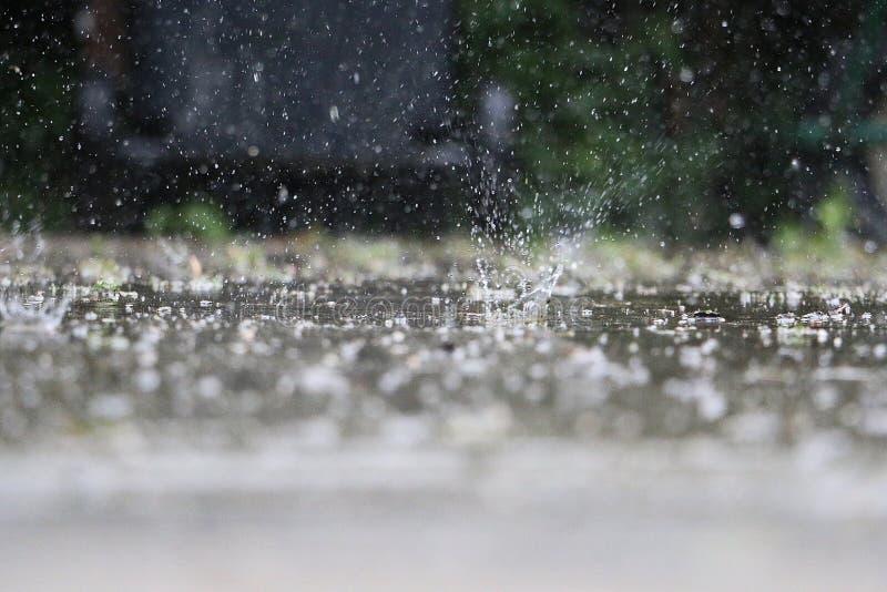 Splashing Rain in the Puddle Stock Image - Image of abstract, drops ...