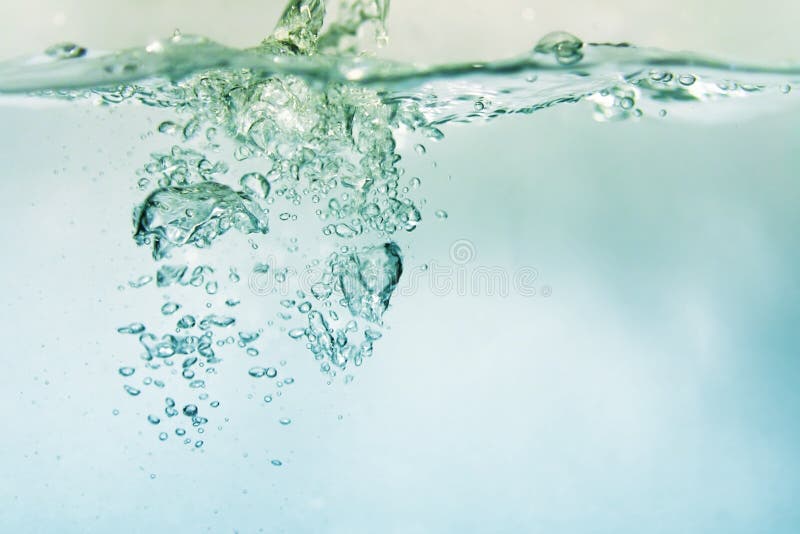 Oil in water stock photo. Image of macro, waves, splash - 5581852