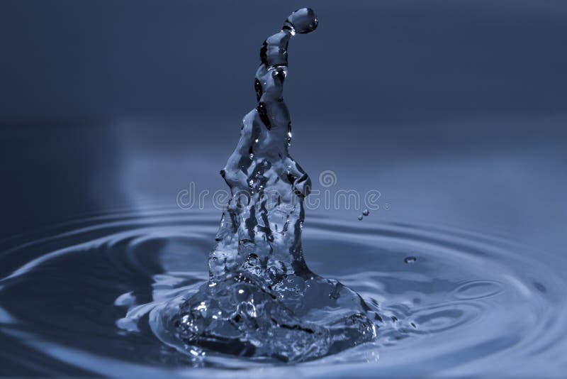 Splashing water drops stock image. Image of bubble, physics - 189250399