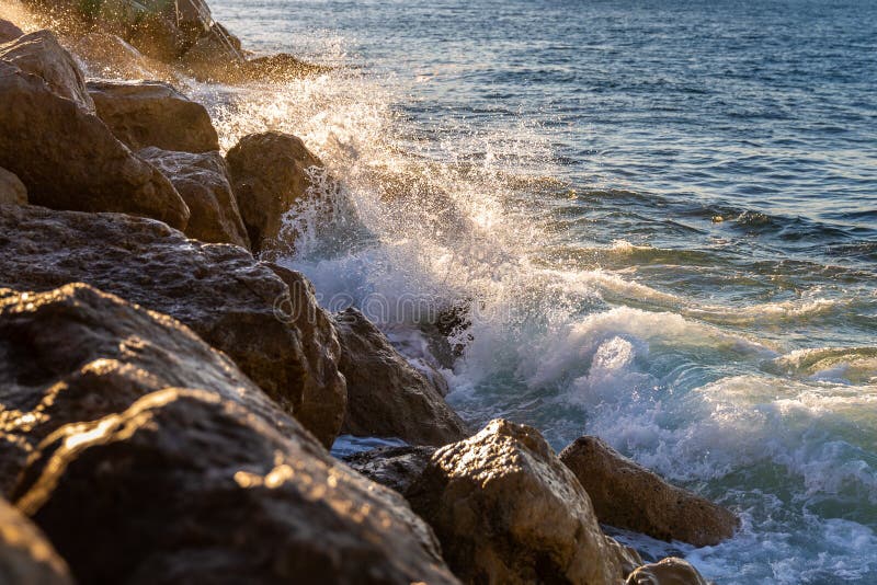 Splashing Water from Touching of Strong Wave on Rocks Stock Photo ...
