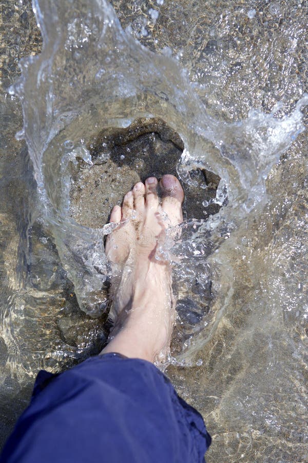 Splashing Water Tourist Feet on Beach Shore Stock Photo - Image of ...