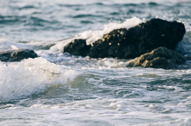 Splashing Wave while Hitting the Rock at the Beach Stock Image - Image ...