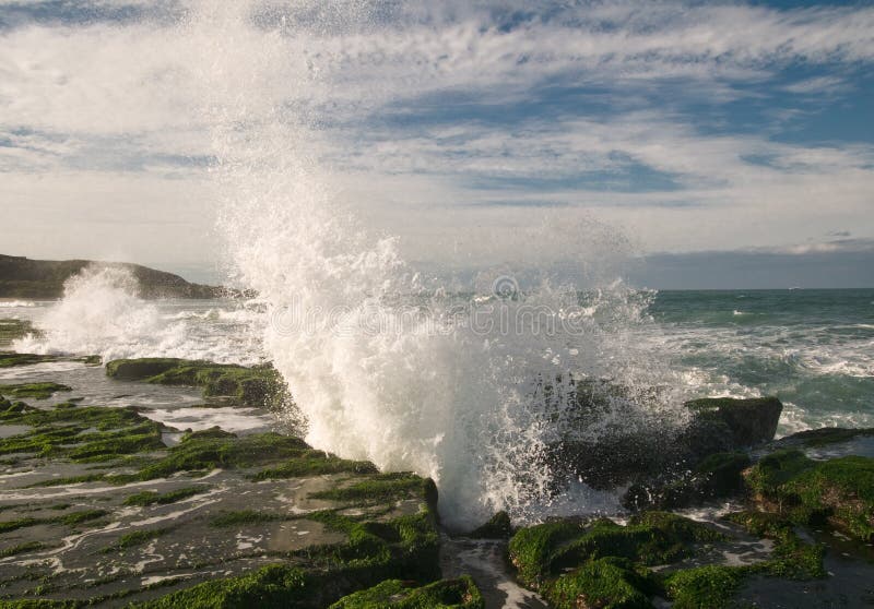 Splashing Wave on Stone Trench Stock Image - Image of blue, wave: 27742963