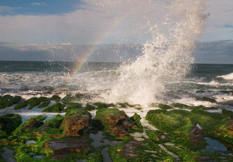 Splashing Wave on Stone Trench with Rainbow Stock Photo - Image of ...
