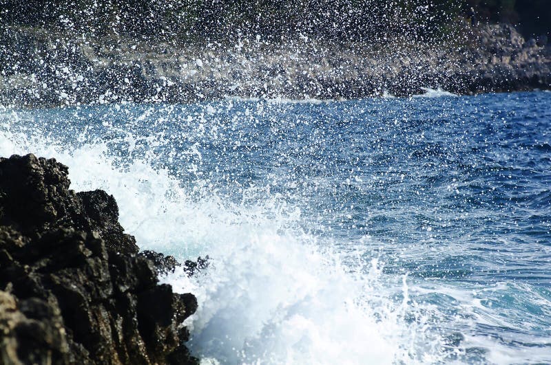 Splashing Waves stock image. Image of breaking, rocks, drops - 772039