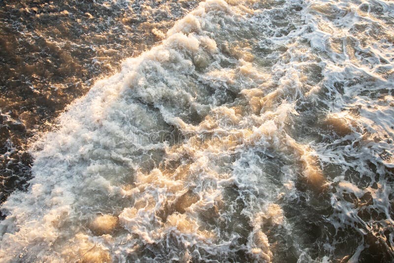 Splashing Waves on the Pebbly Beach on the Sunset Stock Image - Image ...