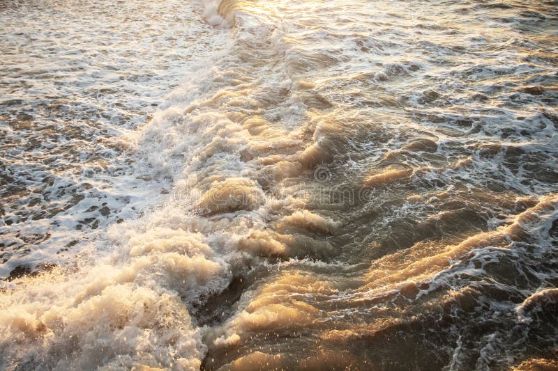 Splashing Waves on the Pebbly Beach on the Sunset Stock Image - Image ...