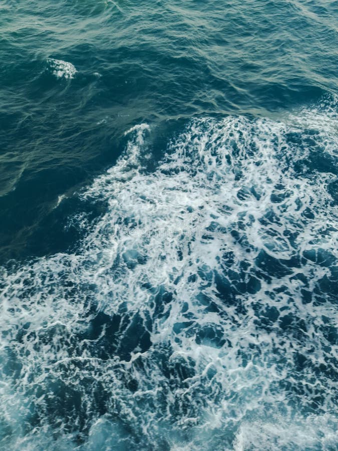 Splashing Waves from the Ship in the Middle of the Sea Stock Photo ...