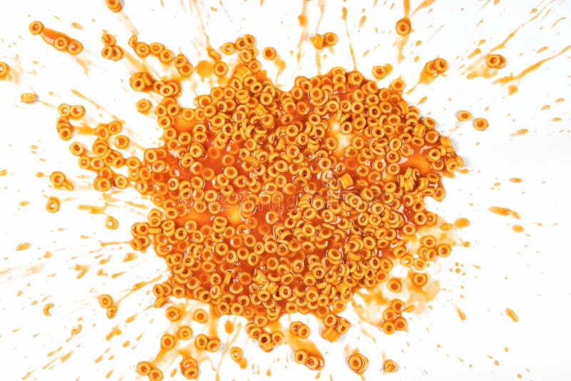 Splattered Spaghetti Rings in Tomato Sauce Stock Photo - Image of close ...
