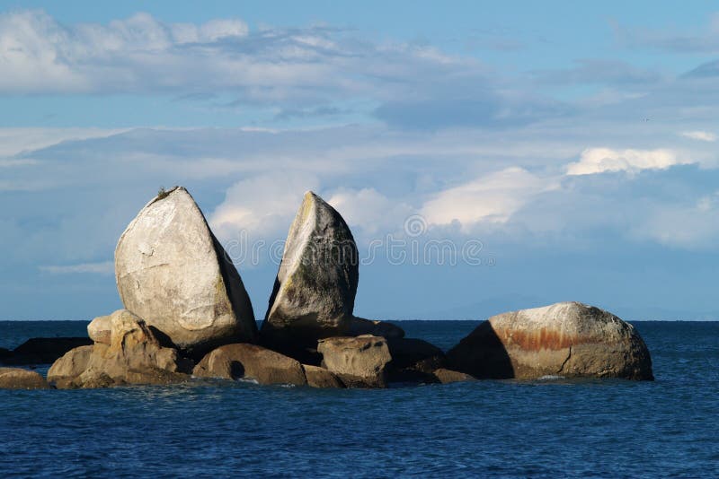 Split apple rock stock image. Image of geology, island - 20939971