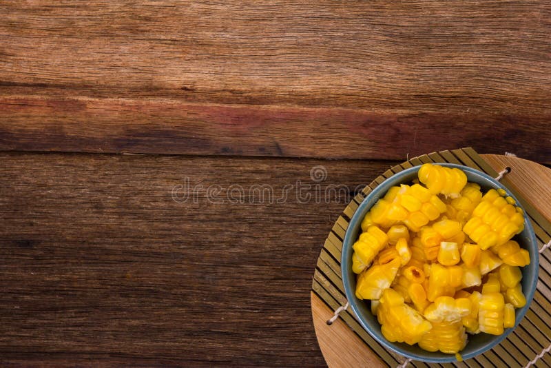 Split Corn on Wood Background Stock Image - Image of ingredient, hand ...