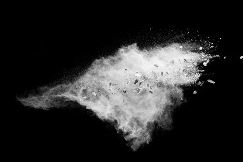 Split Debris of Stone Exploding with White Powder Against Black ...