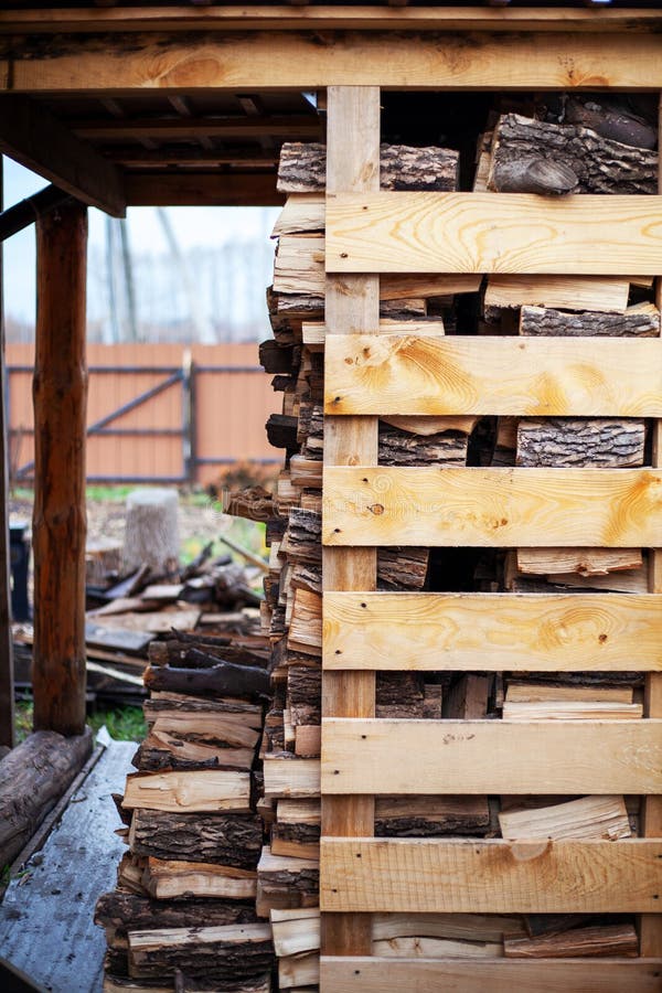 Split Firewood Stacked Under a Canopy Stock Image - Image of material ...