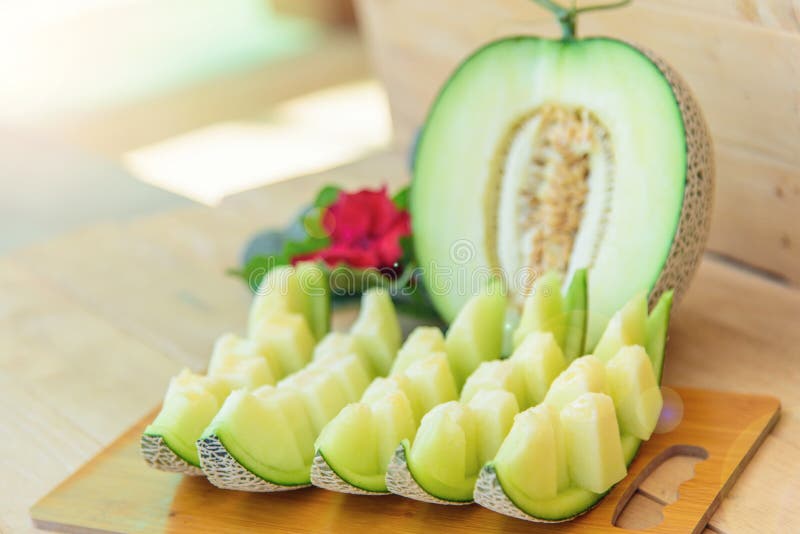 Split the Green Melon on Wood Plate Stock Photo - Image of drink ...