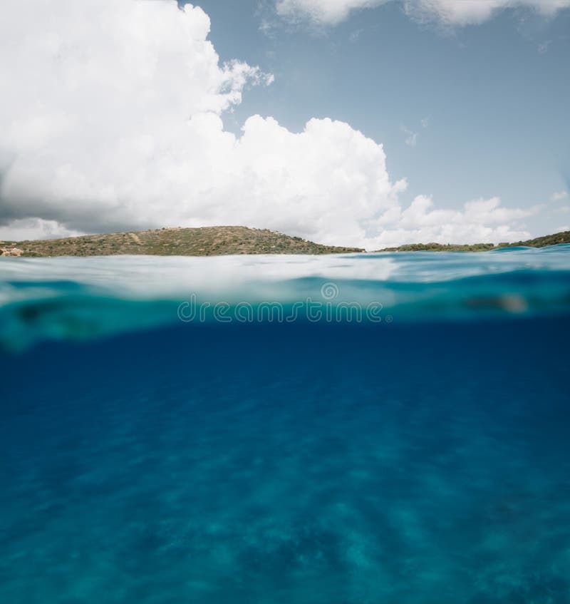 Half Underwater Shot of Surfer Surfing a Wave in Indo Stock Photo ... Half Underwater Shot of Surfer Surfing a Wave in Indo Stock Photo ...