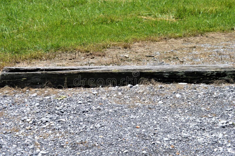 Split Rectangular Wooden Post on Ground Stock Image - Image of gravel ...