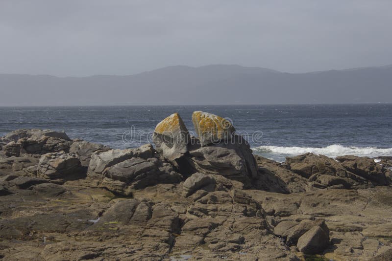 Split Rock Washed by the Sea Stock Image - Image of observing, rock ...