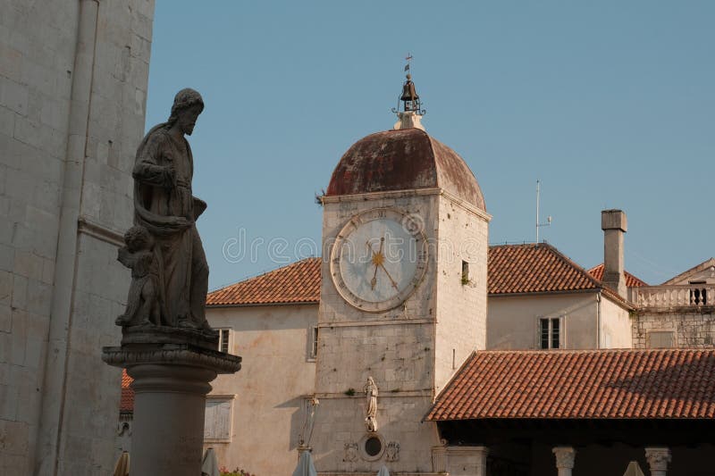 Split S Timekeeper: Clock Tower with Foreground Statue Stock Image ...