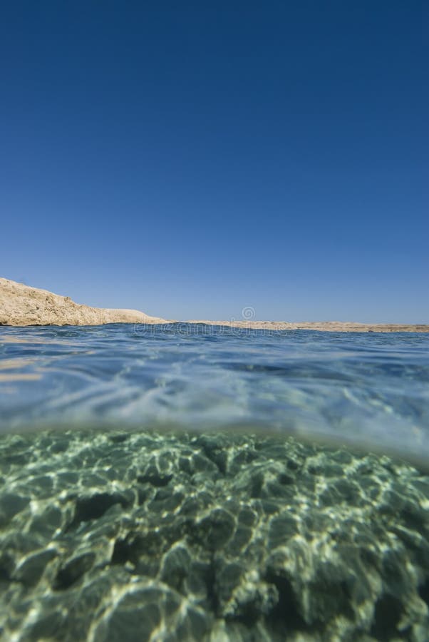 Split View Desert Coastline Blue Water Stock Photo - Image of rocky ...