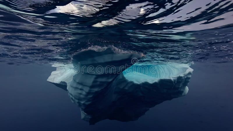 Split View of Iceberg, Revealing Its Massive Submerged Portion Beneath ...