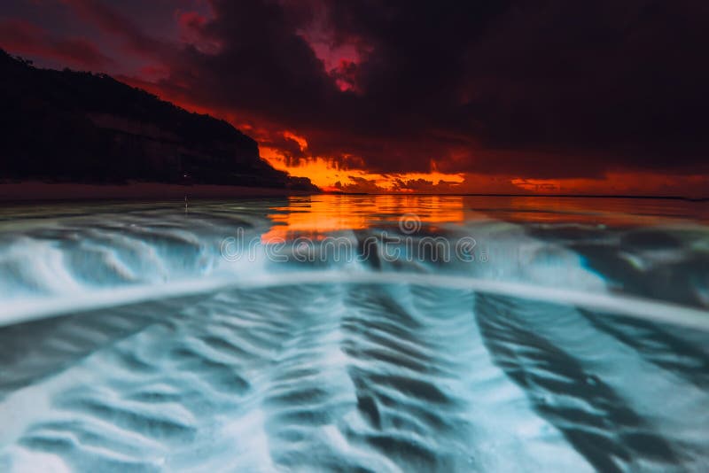 Split View with Sunrise and Underwater Sandy Sea Bottom Stock Image ...