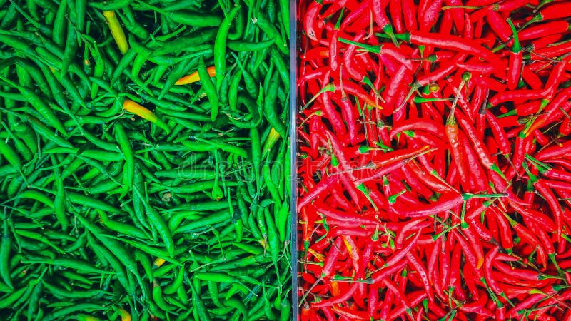 A Split View of Two Different Types of Chili Peppers Stock Photo ...