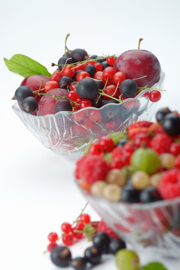 Splitted berries in a bowl stock photo. Image of background - 11809964