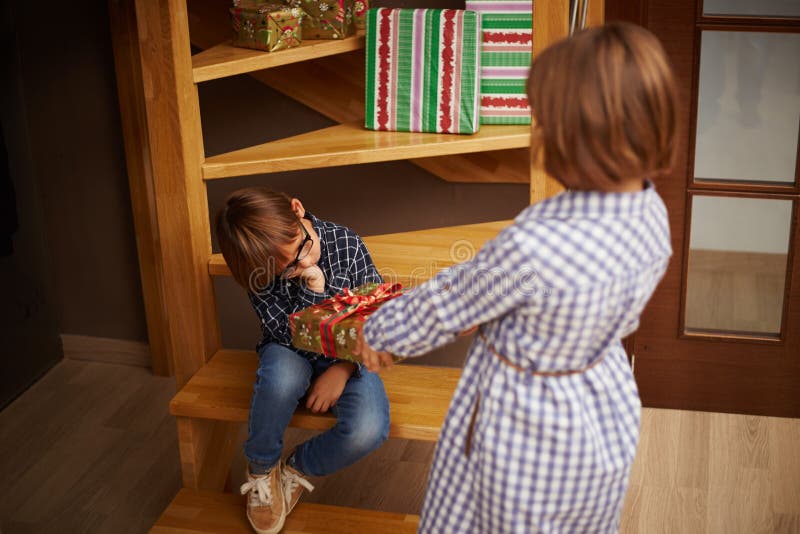 Spoiled Kid Refusing a Christmas Present Stock Image - Image of ...