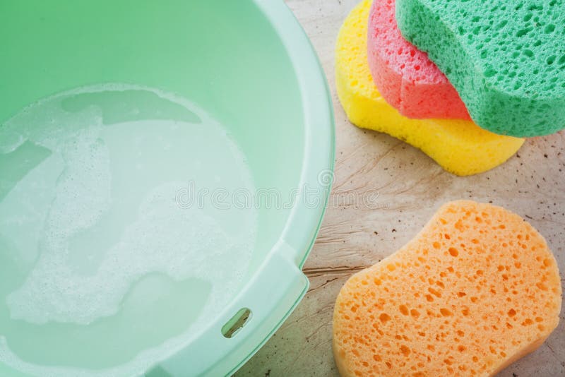 Sponge and bucket to wash stock image. Image of sponge - 28182687