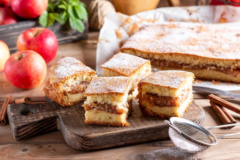 Sponge Cake with Apples on a Wooden Board on the Wooden Table. Homemade ...