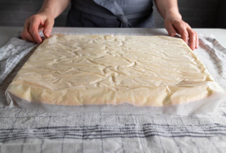 Sponge Cake Base Upside Down for Removing Baking Paper on Kitchen Table ...