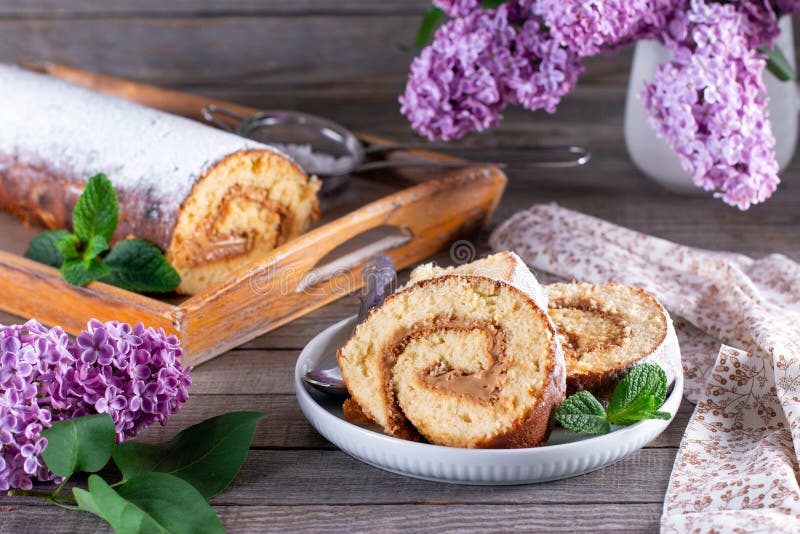 Sponge Cake Roll with Cream in a Plate Stock Photo - Image of dairy ...