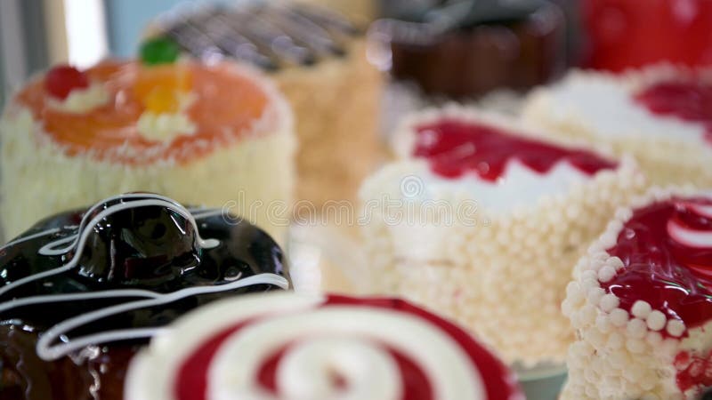 Sponge Cakes on a Rotating Glass Display Case Stock Footage - Video of ...