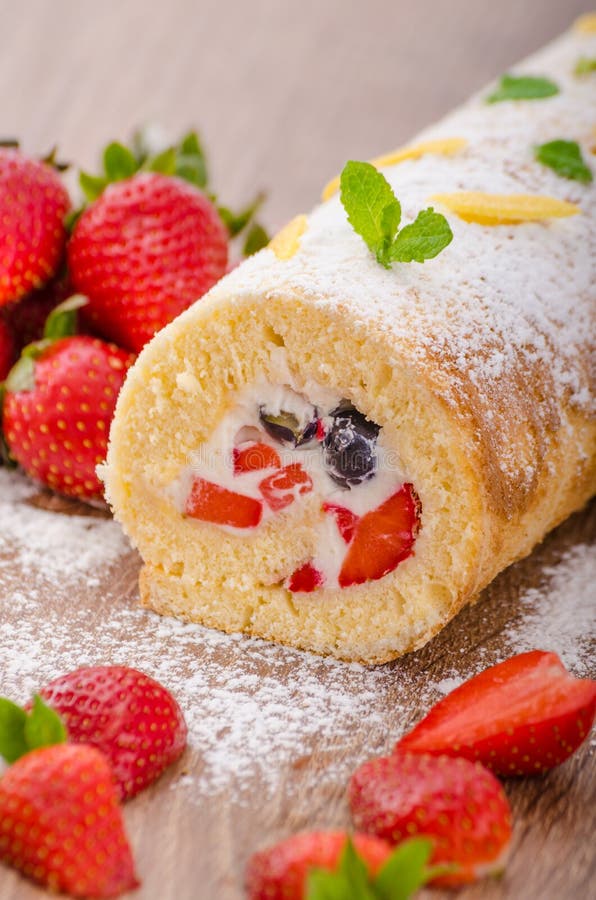 Sponge Roll with Strawberries and Blueberries Stock Photo - Image of ...
