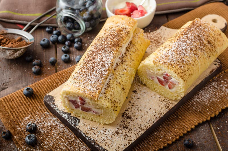 Sponge Roll Stuffed with Strawberry Cream Stock Image - Image of icing ...