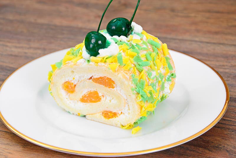 Sponge Roulade with Cream, Mandarin and Cherry Stock Image - Image of ...