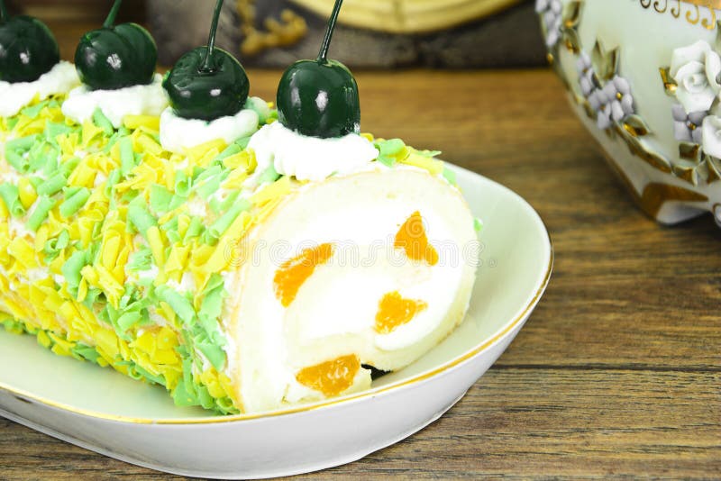 Sponge Roulade with Cream, Mandarin and Cherry Stock Image - Image of ...