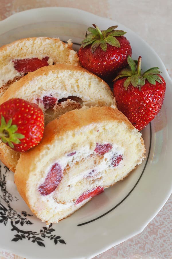Sponge Roulades with Cream and Fresh Strawberries, Close-up Stock Photo ...