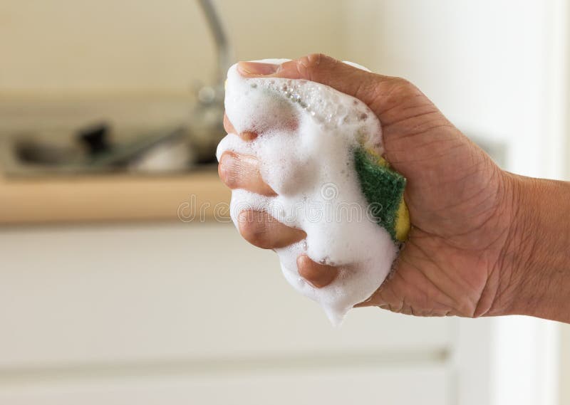 Sponge in Squeeze Hand with Dishwashing Liquid Stock Photo - Image of ...