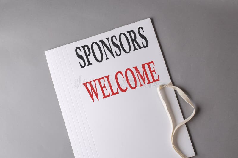 SPONSORS WELCOME Text on White Folder on Grey Background Stock Photo ...