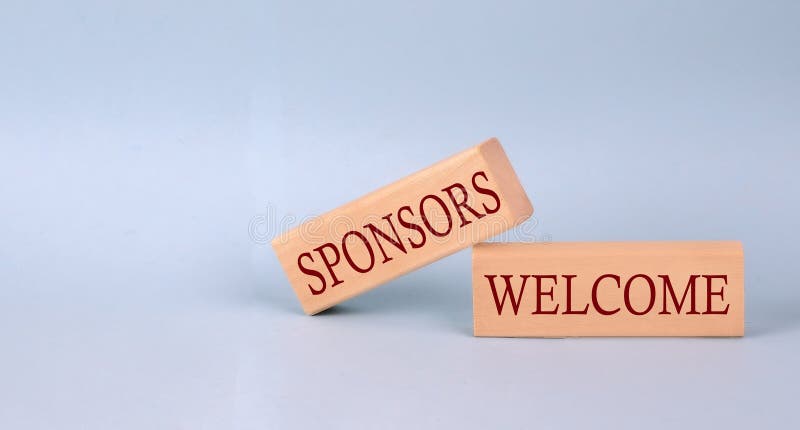 SPONSORS WELCOME Text on the Wooden Block, Blue Background Stock Photo ...