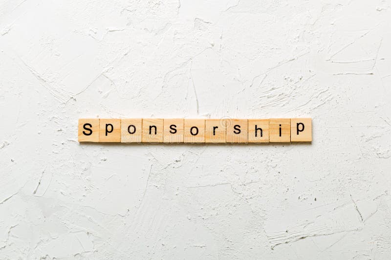Sponsorship Word Written on Wood Block. Sponsorship Text on Table ...