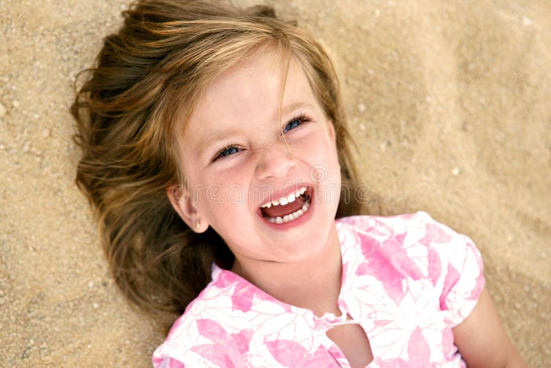 Spontaneous laughing girl stock photo. Image of smiling - 22172632