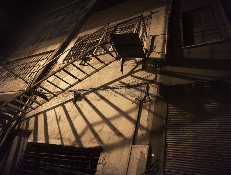 Spooky Back Yard with Fire Escape Stock Photo - Image of fire, ladder ...