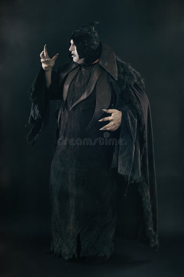 Spooky Devil Vamp with Large Scary Nails. Hell and Horror Stock Image ...