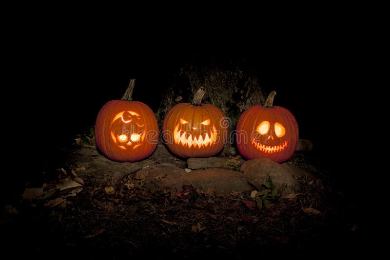 Spooky Jack-o-lanterns Outdoors Stock Image - Image of spooky, darkness ...